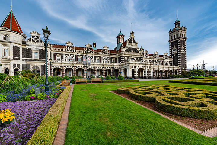 The Square of Dunedin Historical Railway Station, New Zealand - Go Next